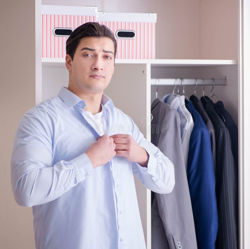 The Young Man Businessman Getting Dressed for Work Stock Image - Image ...