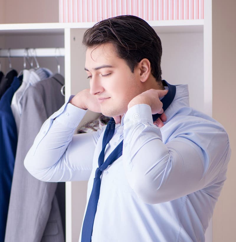 Young Man Businessman Getting Dressed for Work Stock Photo - Image of ...