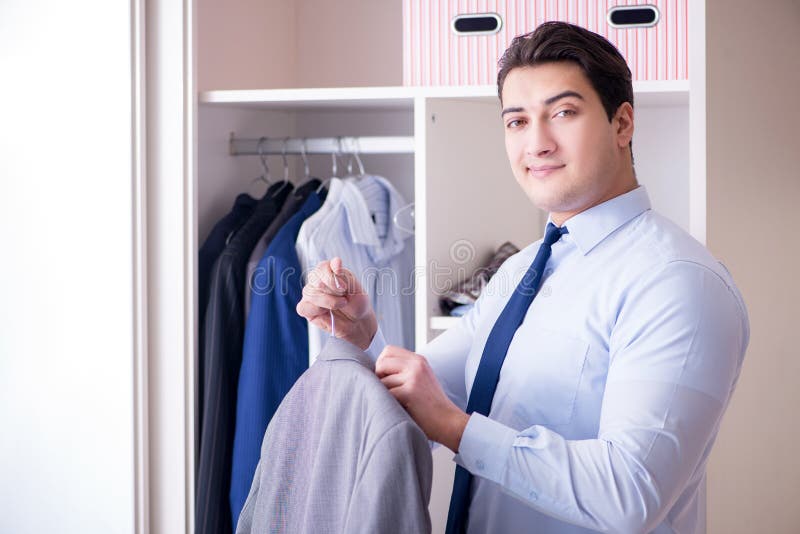 The Young Man Businessman Getting Dressed for Work Stock Photo - Image ...