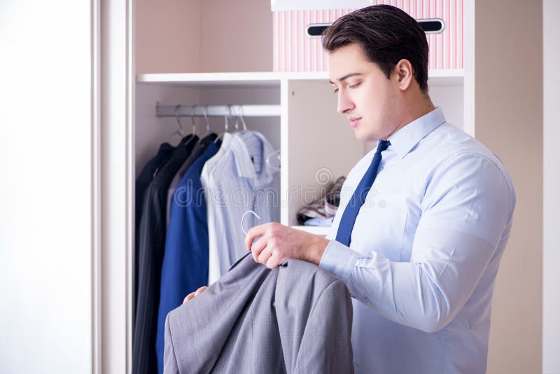 The Young Man Businessman Getting Dressed for Work Stock Image - Image ...