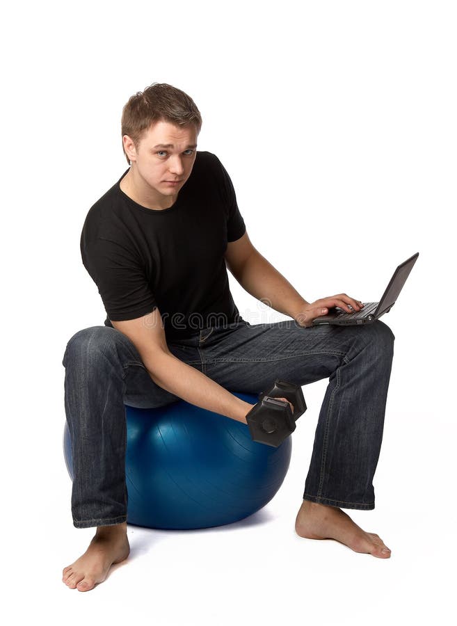 Young man stock photo. Image of dumbbells, overwork, laptop - 95068688