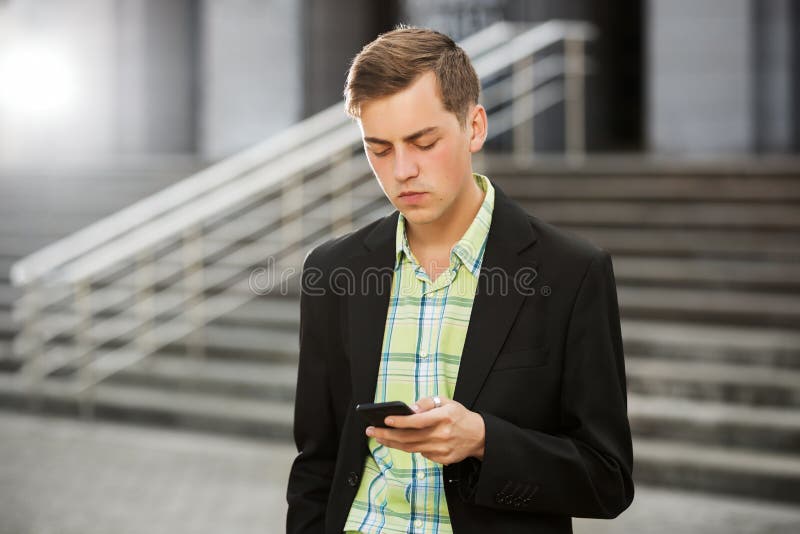 Young Man Calling on Mobile Phone Outdoor Stock Image - Image of human ...