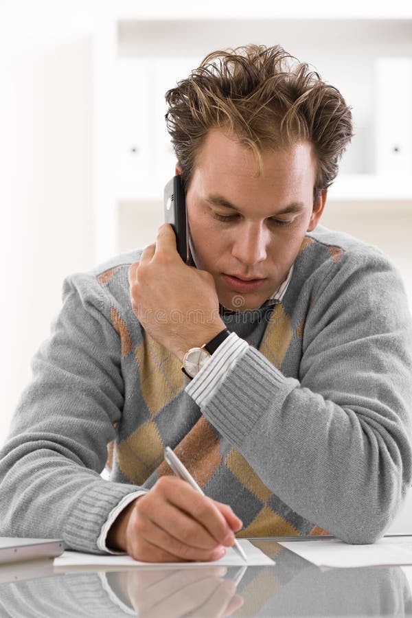 Young man calling on phone stock photo. Image of office - 7690036