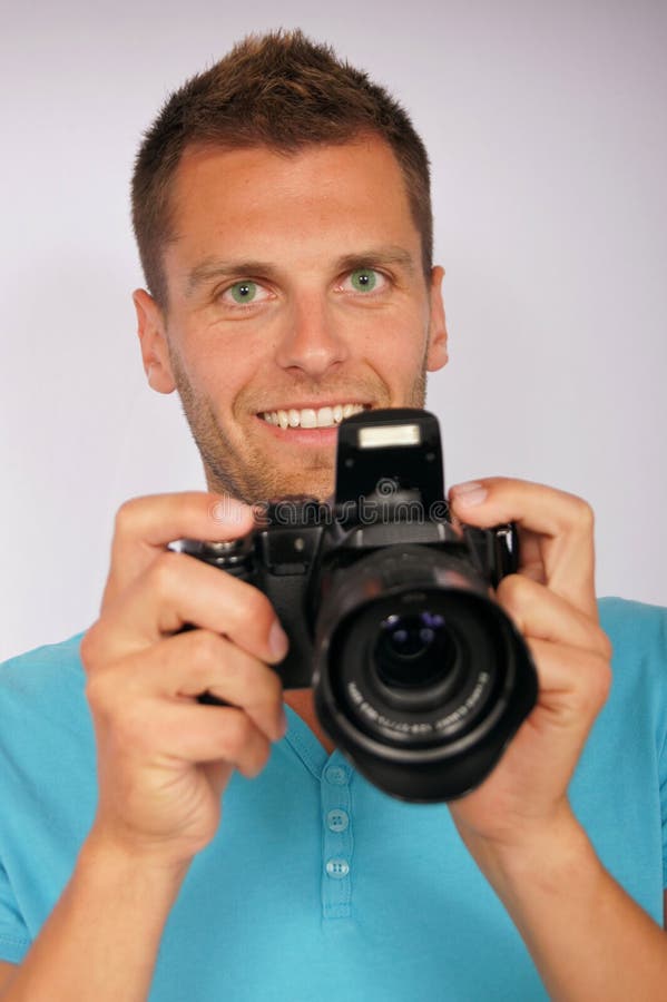 Young man with a camera stock image. Image of lifestyle - 15515653