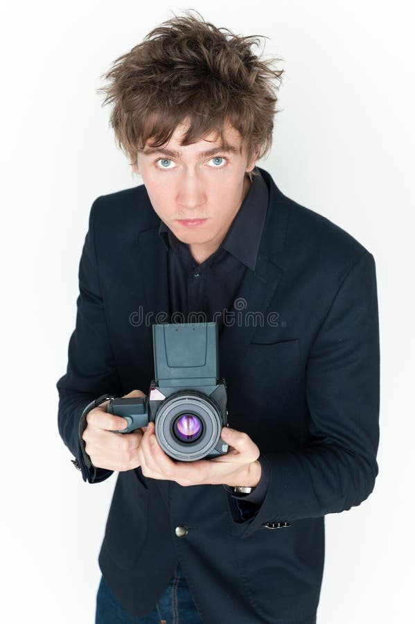 Young man with camera. stock photo. Image of hair, caucasian - 23090776