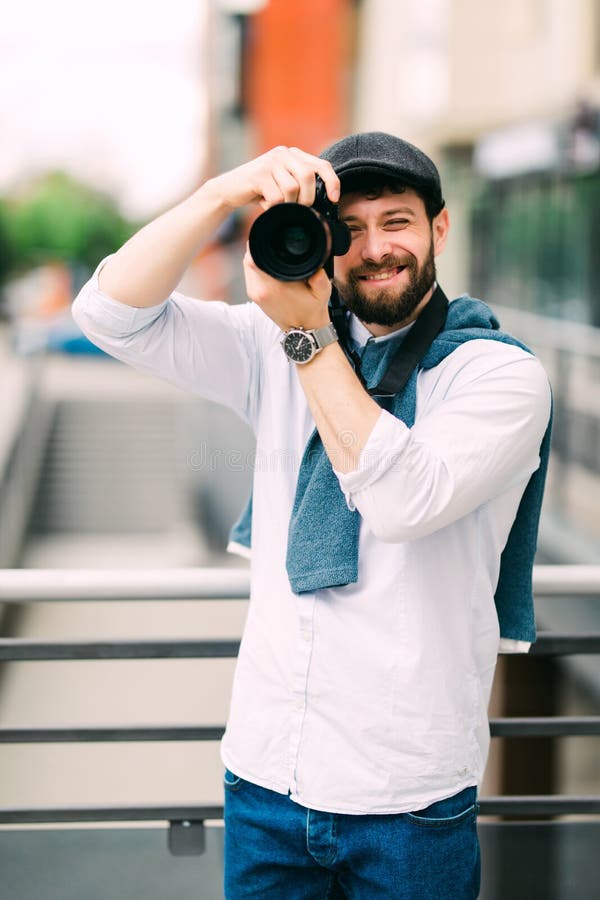 Young Man with Camera Photographing at the Street Stock Image - Image ...