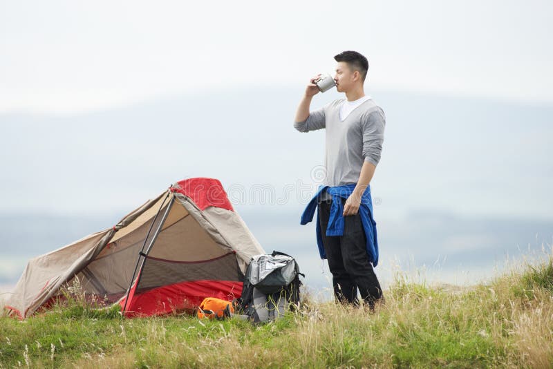 Young Man on Camping Trip in Countryside Stock Image - Image of ...