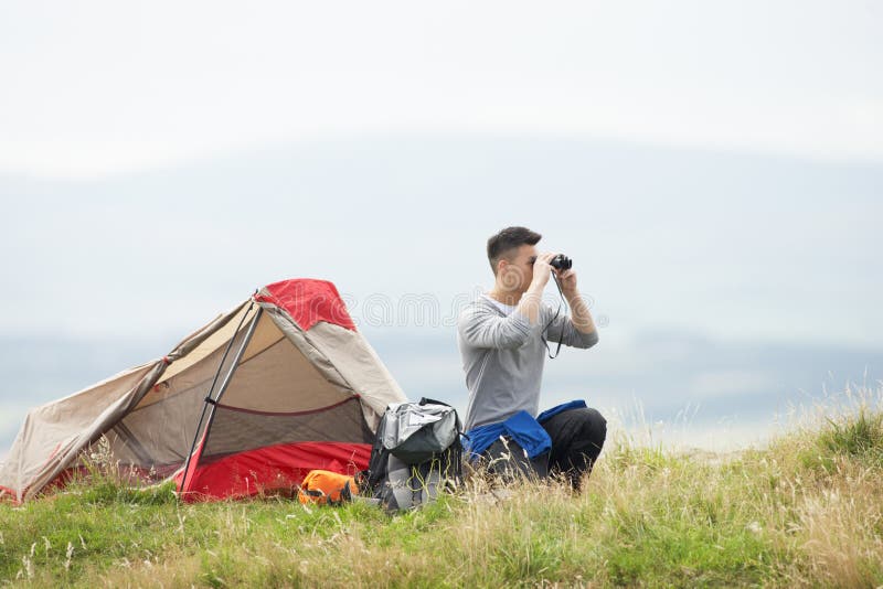 Young Man on Camping Trip in Countryside Stock Image - Image of outdoor ...