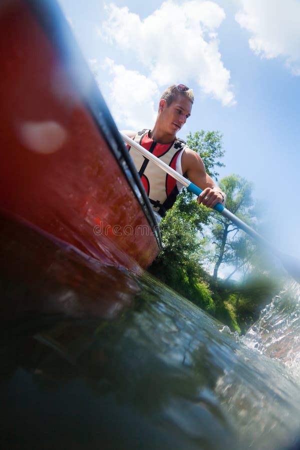 Young Man Canoeing stock photo. Image of germany, healthy - 85684146