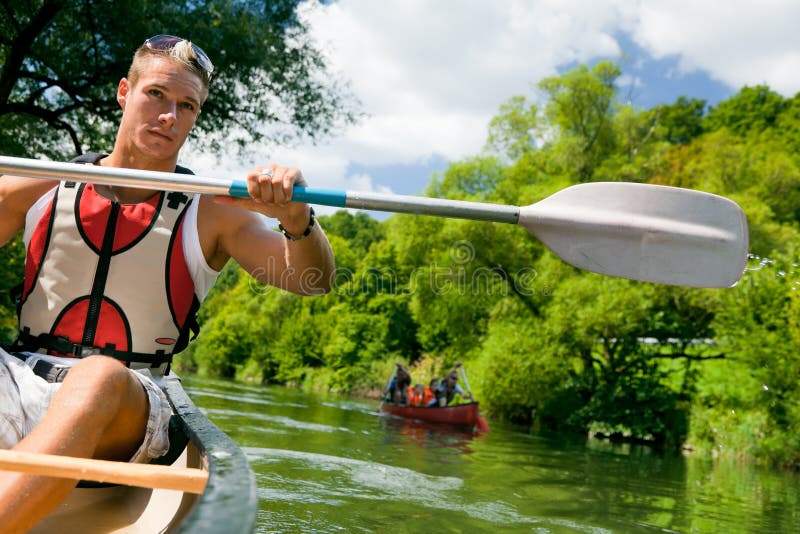 Young Man Canoeing stock photo. Image of person, paddling - 86022462