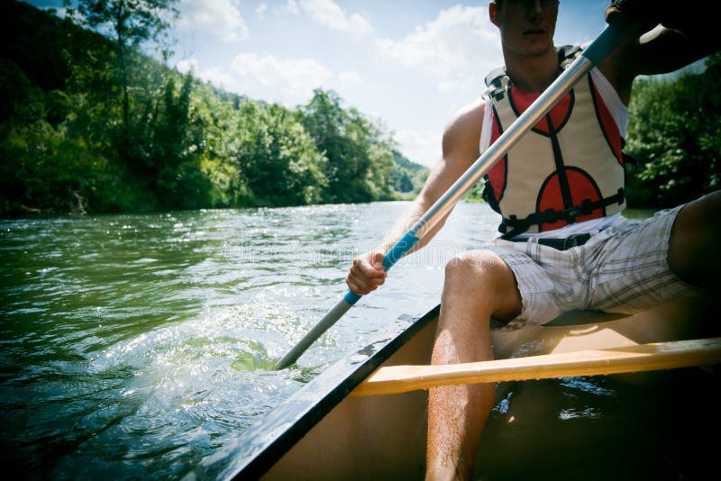 Young Man Canoeing stock image. Image of health, canoe - 103682401