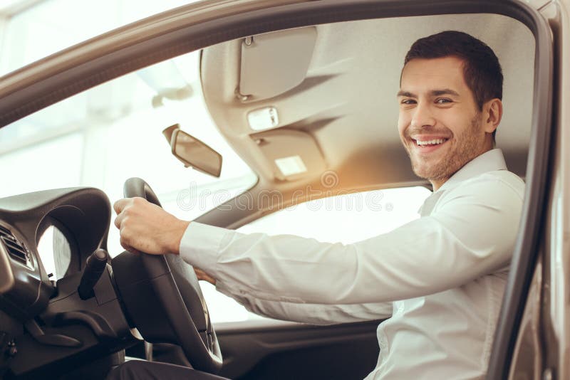 Young Man in a Car Rental Service Test Drive Concept Stock Photo ...