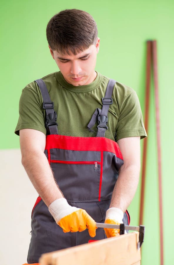 Young Man Carpenter Working in Workshop Stock Image - Image of ...