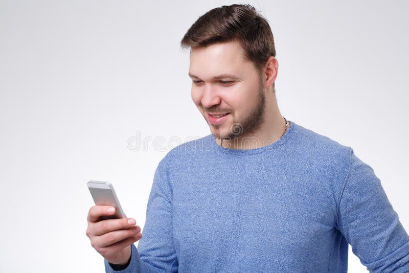 Young Man with the Cell Phone Stock Photo - Image of adult, photograph ...