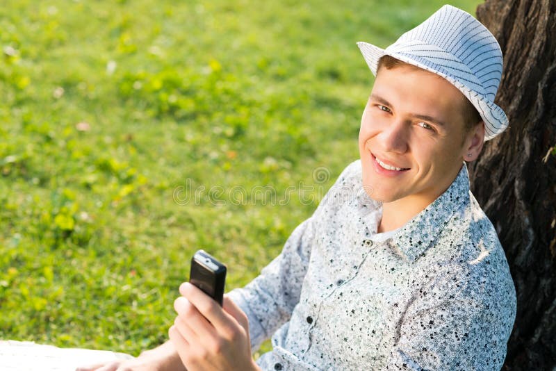 Young Man with a Cell Phone Stock Photo - Image of caucasian, male ...