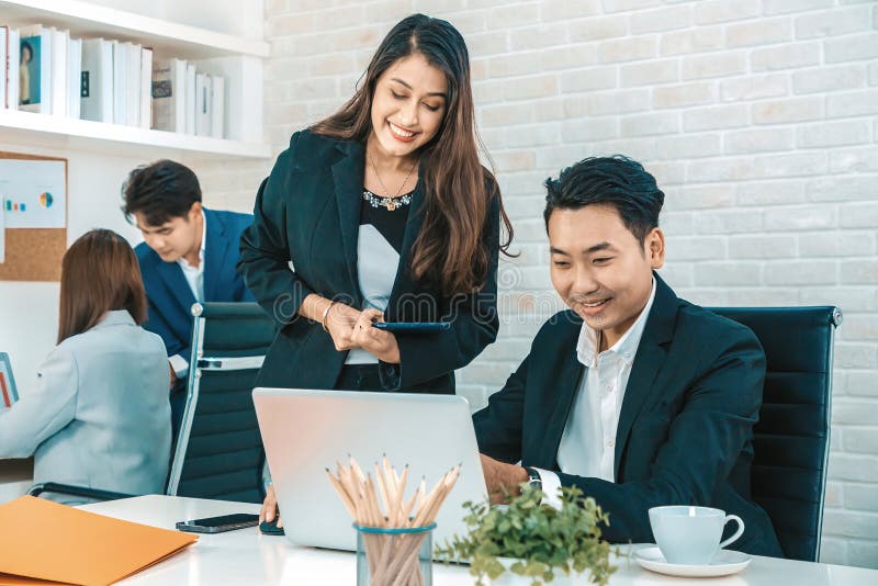 Young Man CEO Smile and Discussing Work with His Co-worker Stock Photo ...