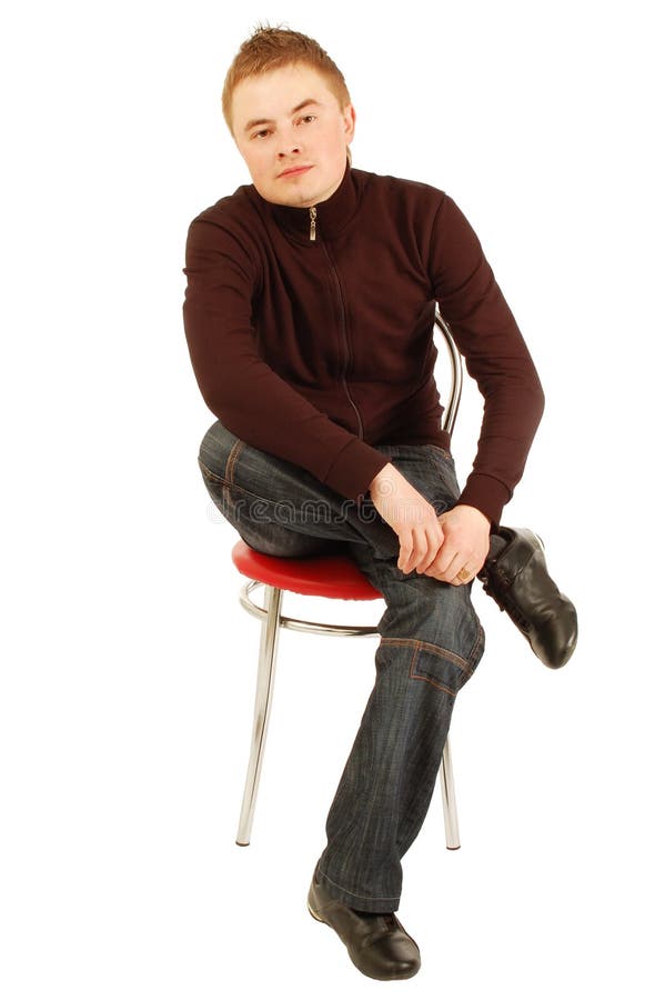 Young man on a chair stock image. Image of studio, thoughtful - 5394217