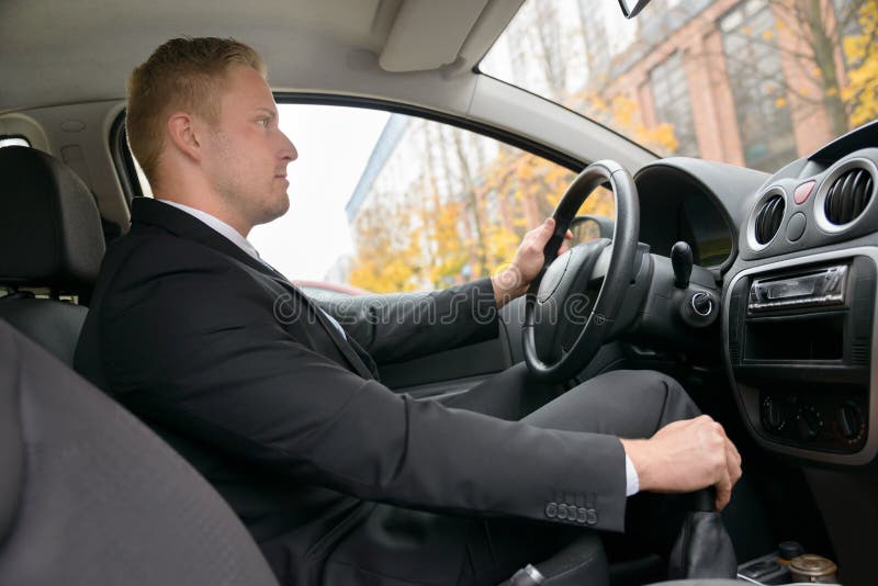 Man Changing Gear while Driving a Car Stock Photo - Image of caucasian ...