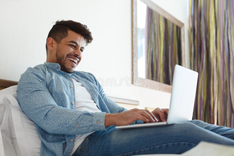 Young Man Chatting on Laptop with Friends Stock Photo - Image of muslim ... Young Man Chatting on Laptop with Friends Stock Photo - Image of muslim ...