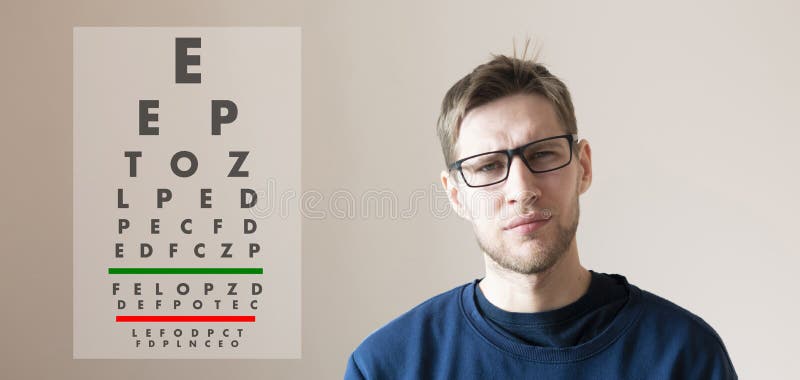 A Young Man Check the Eyesight Vision, Examine the Health with Test ...