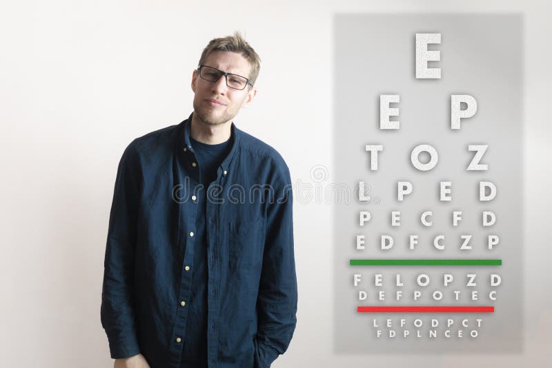 A Young Man Check the Eyesight Vision, Examine the Health with Test ...