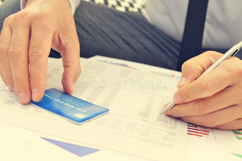 Young Man Checking the Information of His Credit Card Stock Image ...