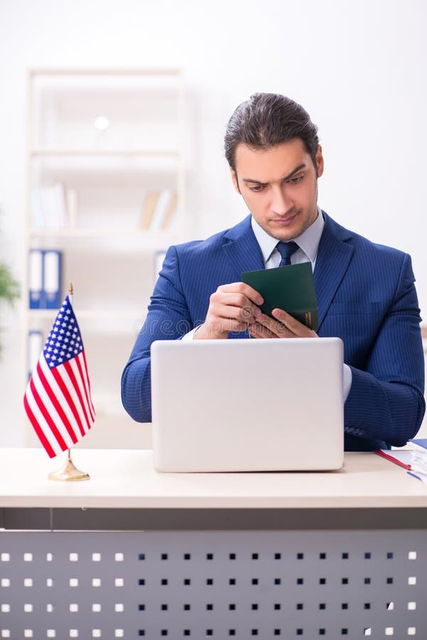 Young Man Checking Passport at USA Embassy Stock Image - Image of ...