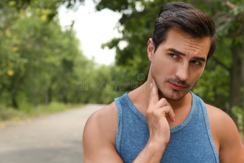 Young Man Checking Pulse after Training in Park. for Text Stock Photo ...