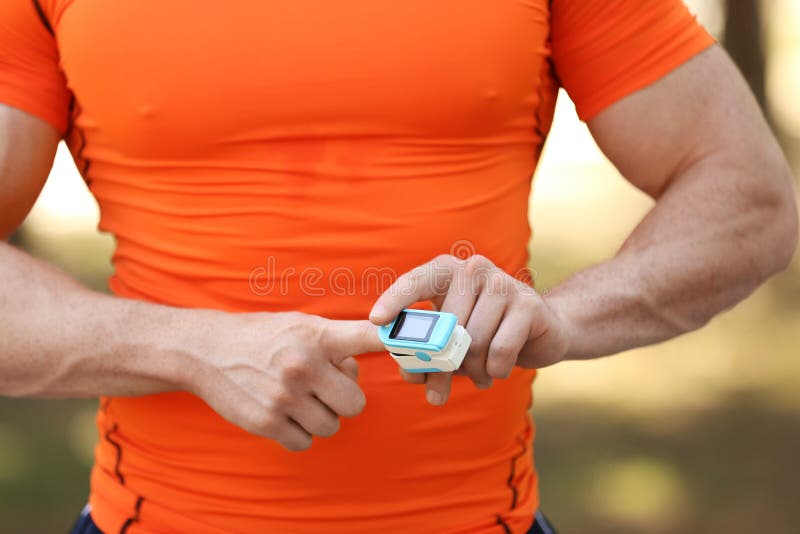 Young Man Checking Pulse after Workout, Focus Stock Image - Image of ...