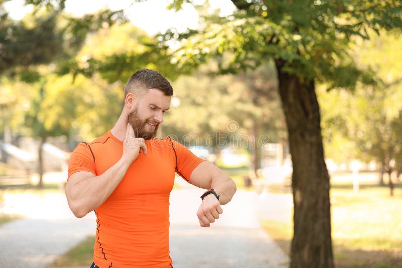 Young Man Checking Pulse after Workout Stock Image - Image of adult ...