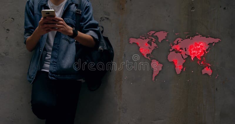 Young Man Checking Smartphone with World Map Highlighting Pandemic ...