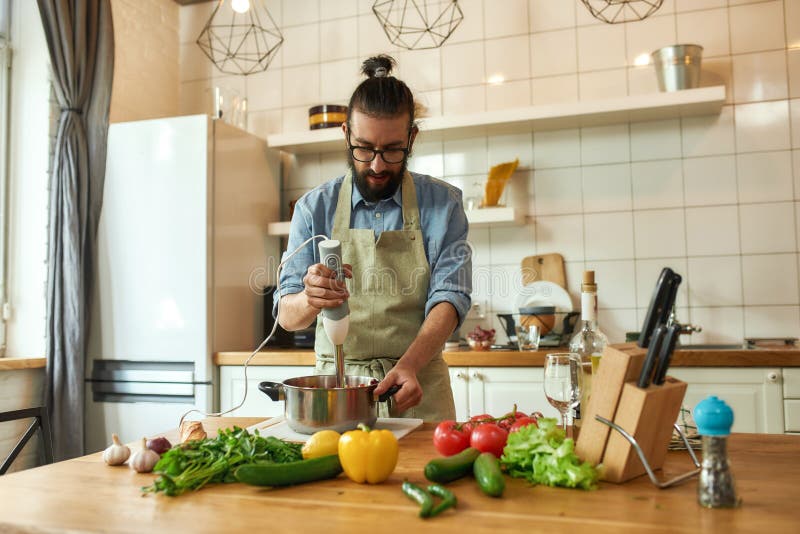 Young Man, Chef Cook Using Hand Blender while Preparing Italian Meal in ...