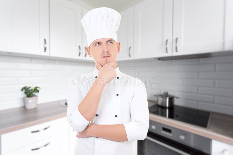 Young Man Chef Dreaming in White Modern Kitchen Stock Photo - Image of ...
