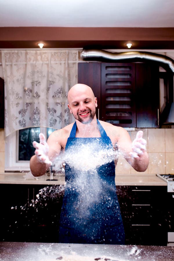 A Young Man Chefs Throw Flour Stock Photo - Image of flour ...