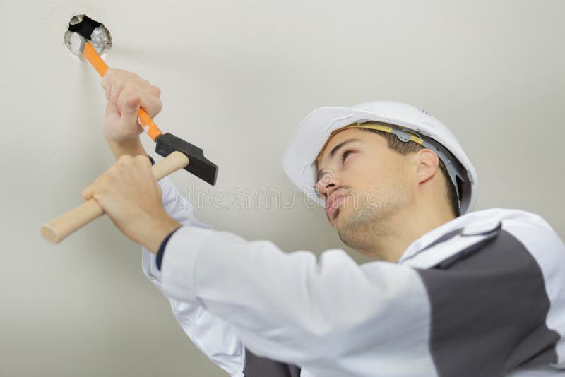Young Man with Chisel and Hammer Stock Image - Image of engineering ...