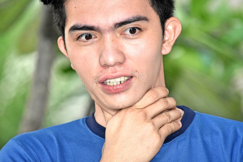 A Young Man Choking stock photo. Image of male, choke - 138908296
