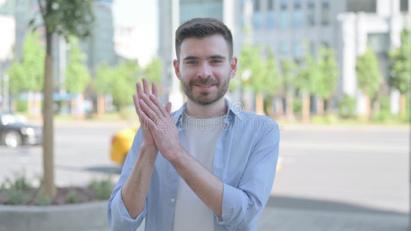 Young Man Clapping in Appreciation Outdoor Stock Photo - Image of ...