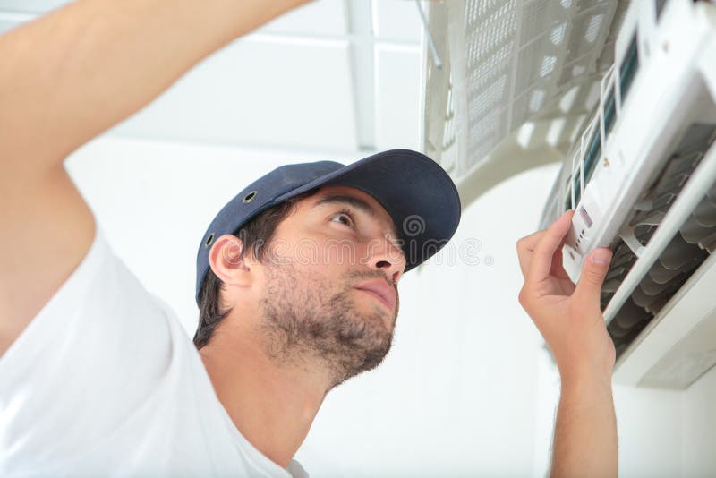 Man Cleaning Air Conditioning System Stock Photo - Image of home ...