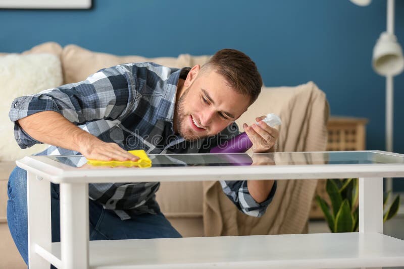 Young man cleaning flat stock image. Image of caucasian - 151349505