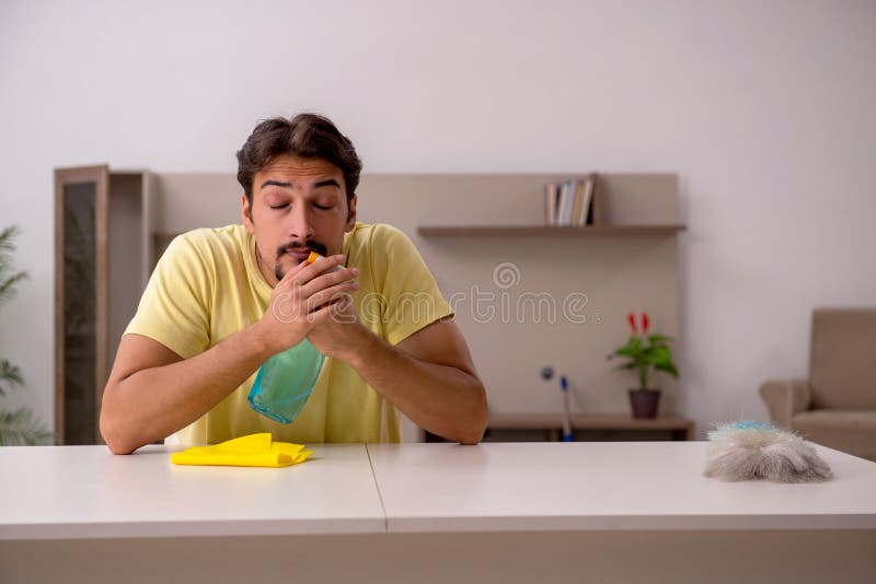 503 Man Dusting Desk Stock Photos - Free & Royalty-Free Stock Photos ...