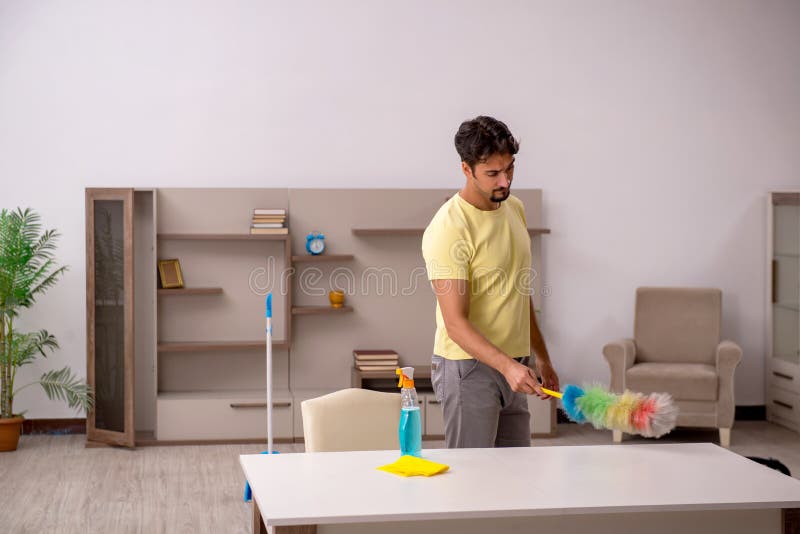 Young Man Doing Housework at Home Stock Photo - Image of husband ...