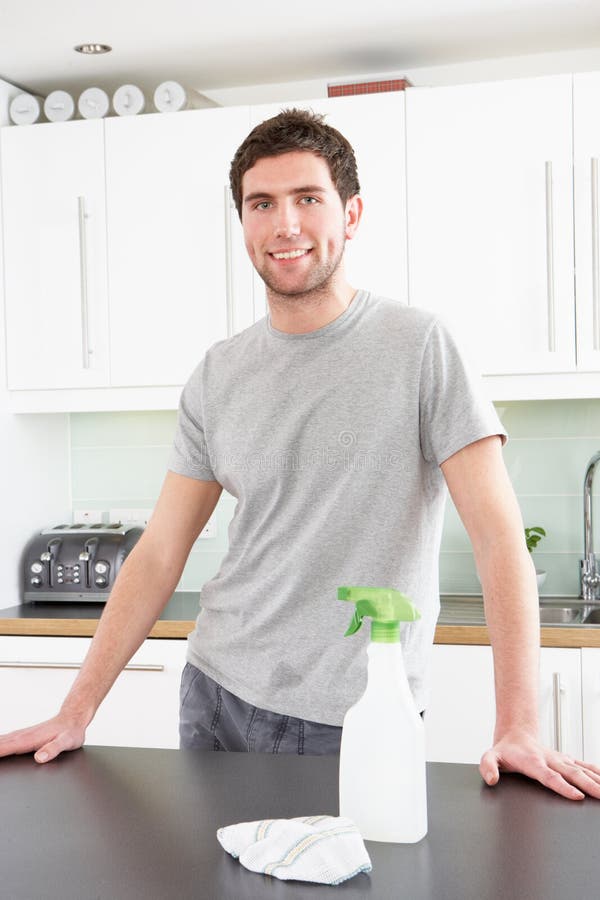 Young Man Cleaning Modern Kitchen Stock Photo - Image of relaxing ...