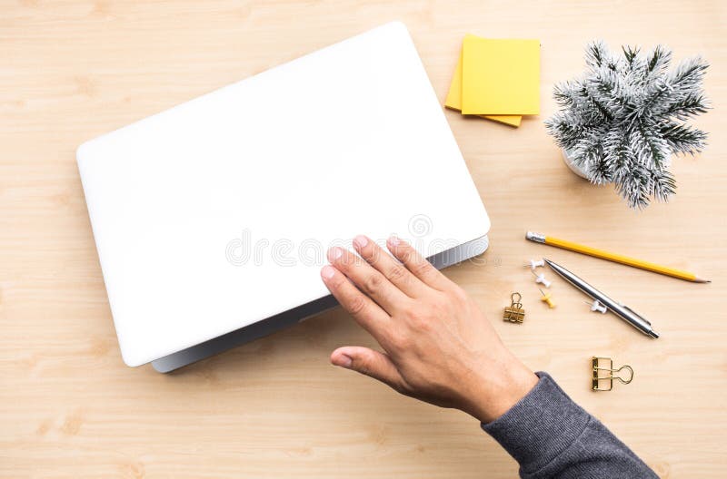 Young Man Closing Computer Laptop with Accessories Object on Wood Desk ...