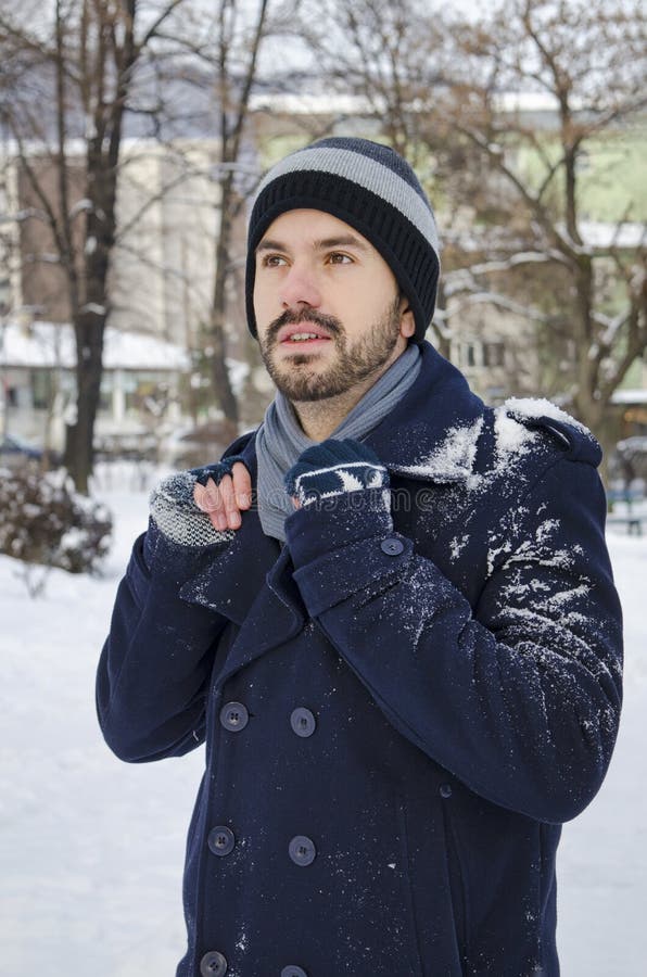 Young Man in a Coat Covered with Snow Stock Image - Image of cold ...