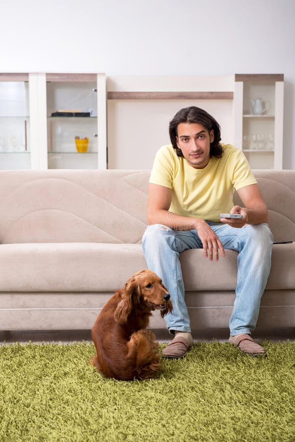 Young Man with Cocker Spaniel Dog Stock Photo - Image of channels ...