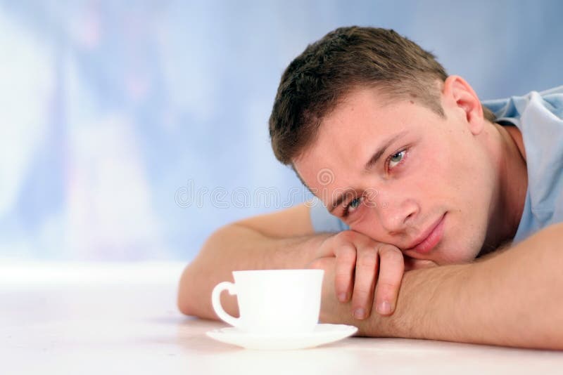 Young man with coffee stock photo. Image of portrait - 22629636