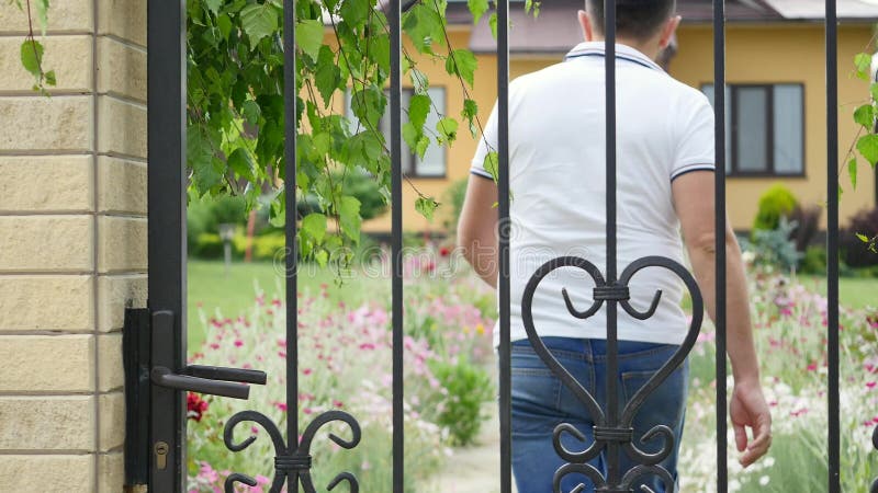 Young Man Coming Home, Opening, Closing Gate, Yard, Summer Stock ...