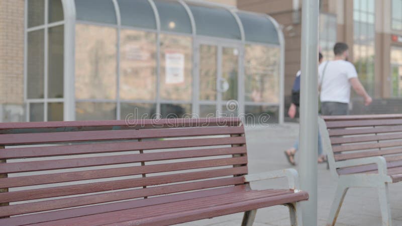 Young Man Coming, Sitting on Bench and Opening Laptop Stock Image ...