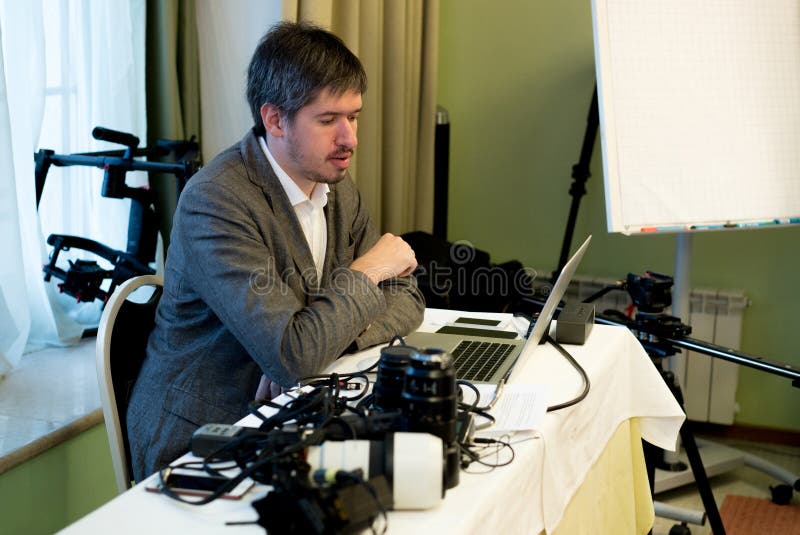 Young Man at Conference with Camera Stock Image - Image of lecture ...