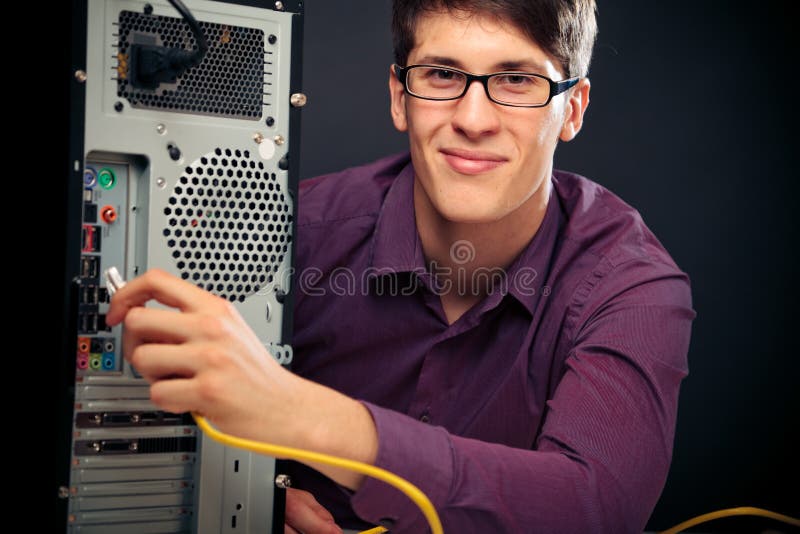 Young Man Connecting Network Cable Stock Photo - Image of connection ...
